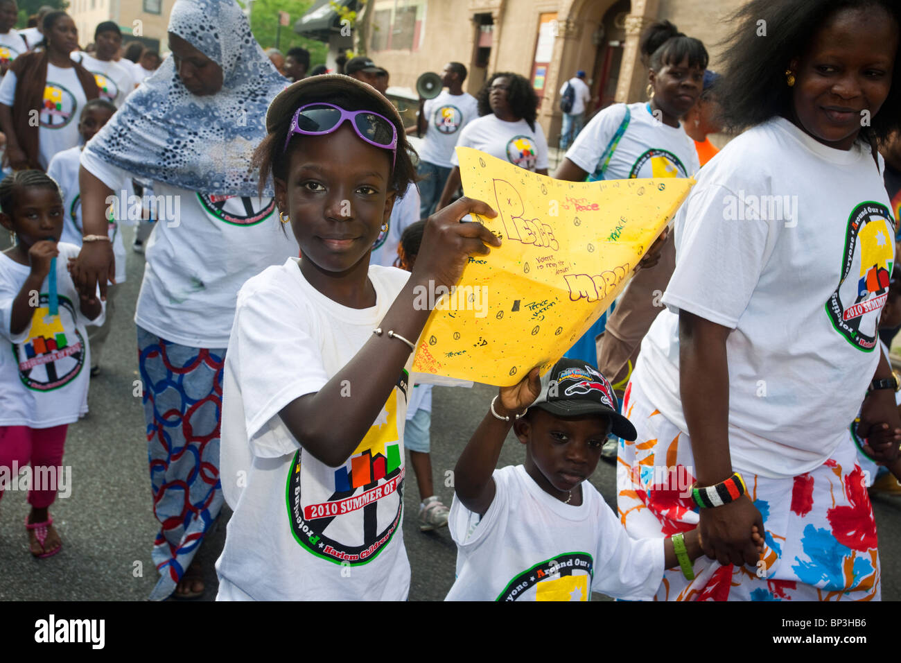 Hundreds march through the streets of Harlem in the Harlem Children's ...