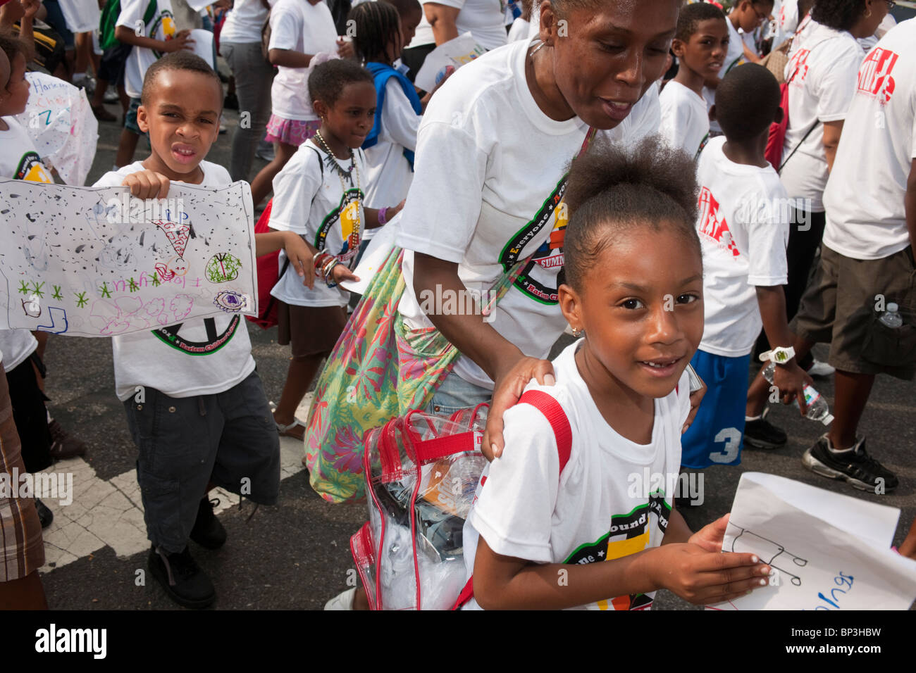 Hundreds march through the streets of Harlem in the Harlem Children's ...