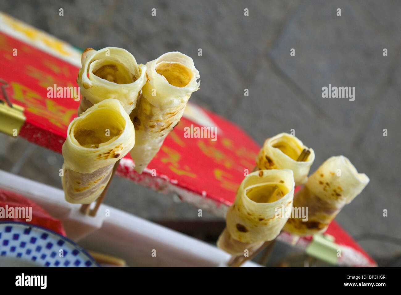 CHINA, Yunnan Province, Dali. Dali Old Town- Rolled pancake snacks ...