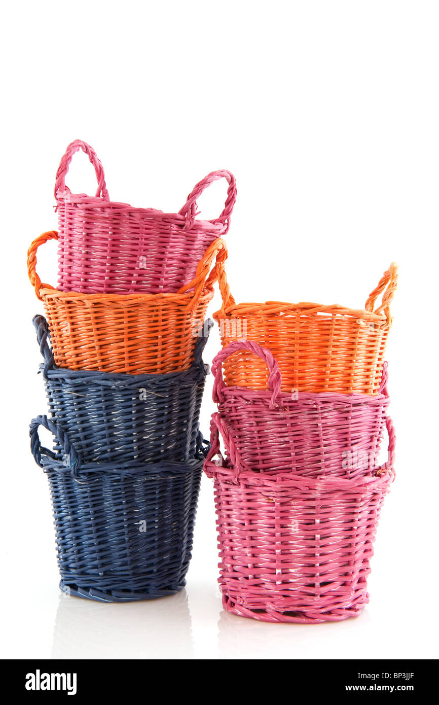 stacked colorful baskets in pink blue and orange Stock Photo - Alamy