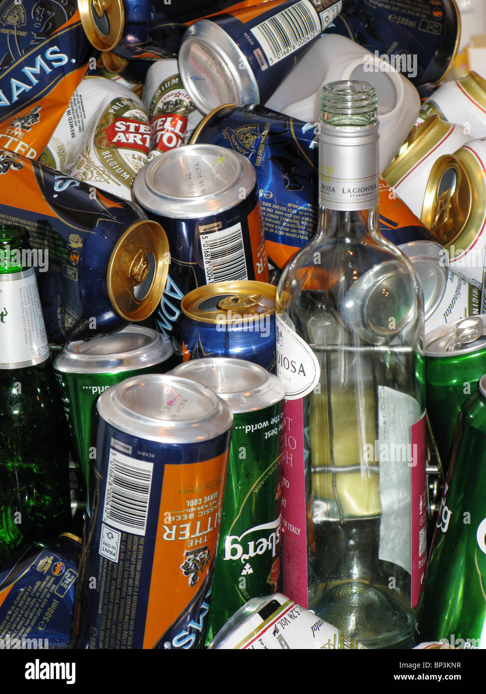 Plastic glass and cans for recycling Stock Photo - Alamy