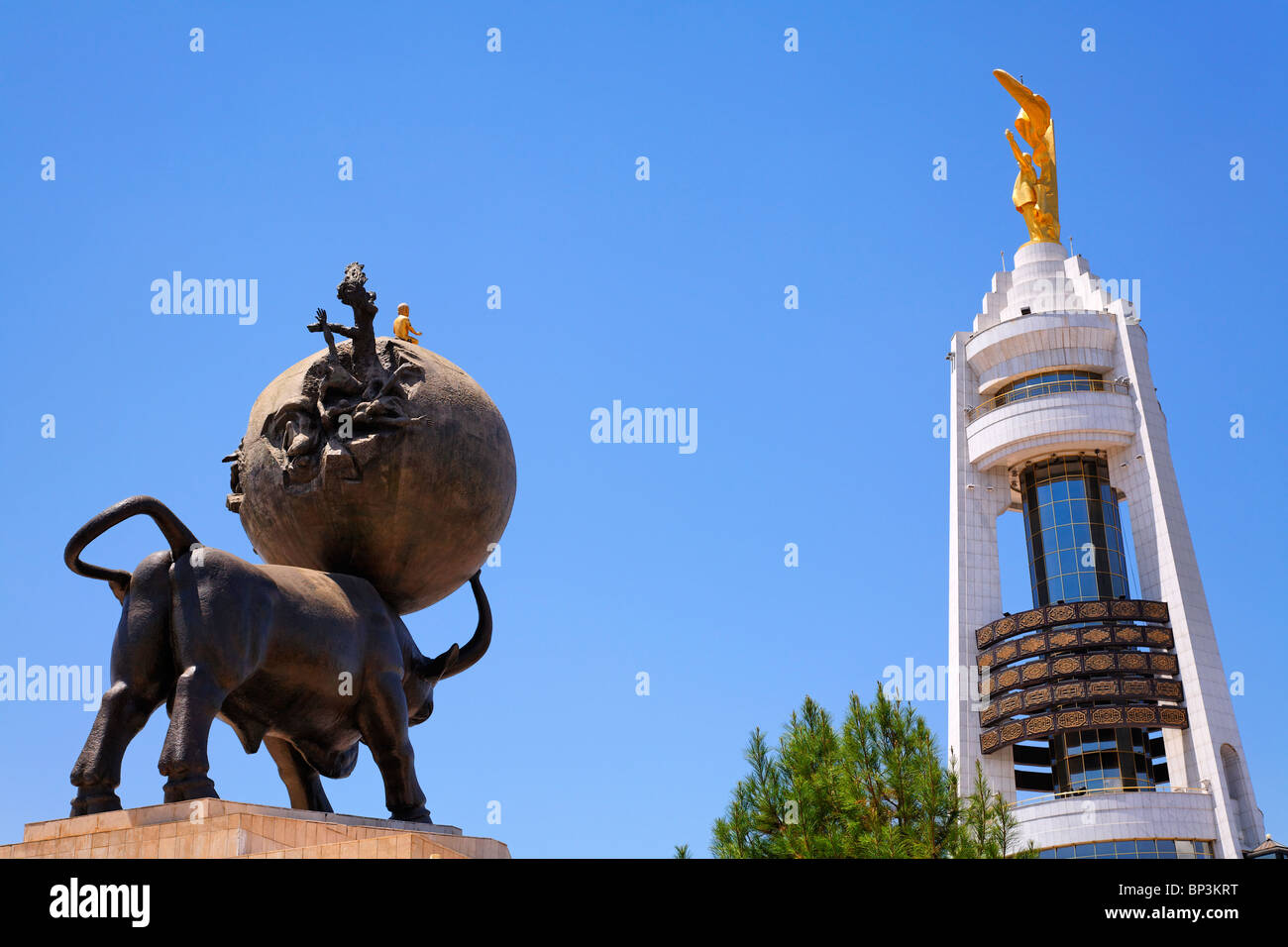 Turkmenistan - Ashgabat - the Earthquake memorial statue and the Arch ...
