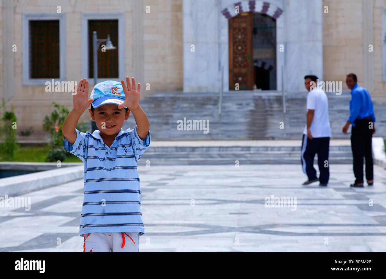 Turkmenistan - Ashgabat - boy at the Azadi mosque Stock Photo - Alamy