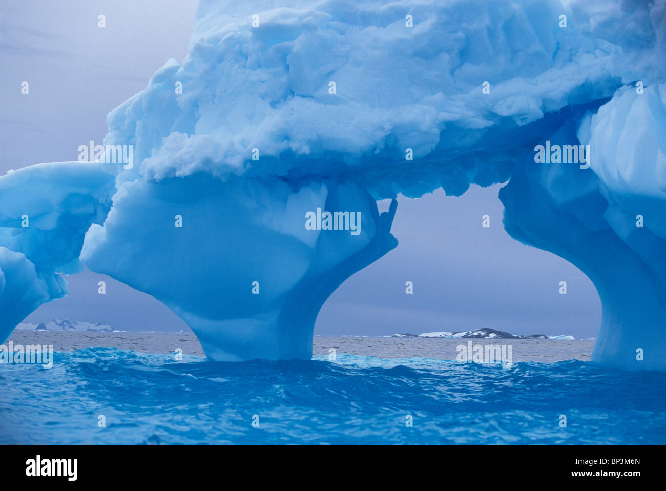Antarctica, Petermann Island, Deep blue iceberg floating in Argentine ...