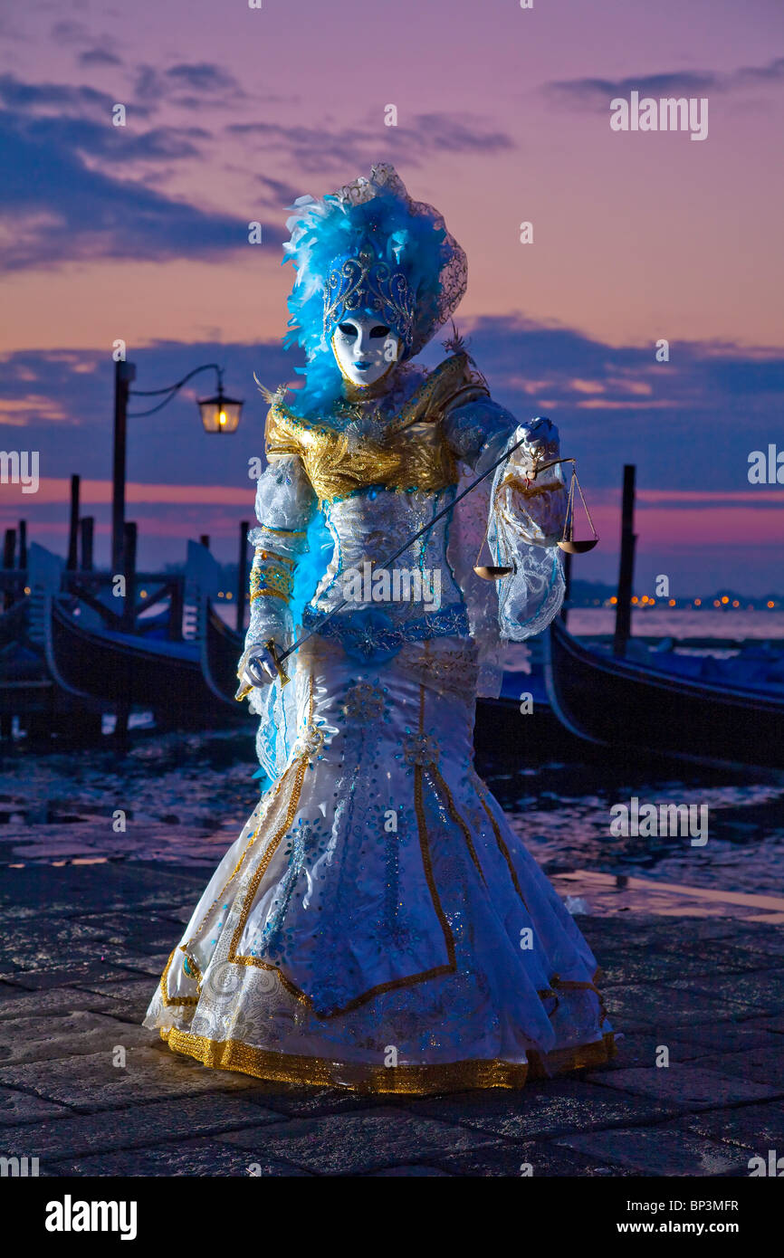 Costumed model during Carnival in Venice, Italy at sunrise Stock Photo ...