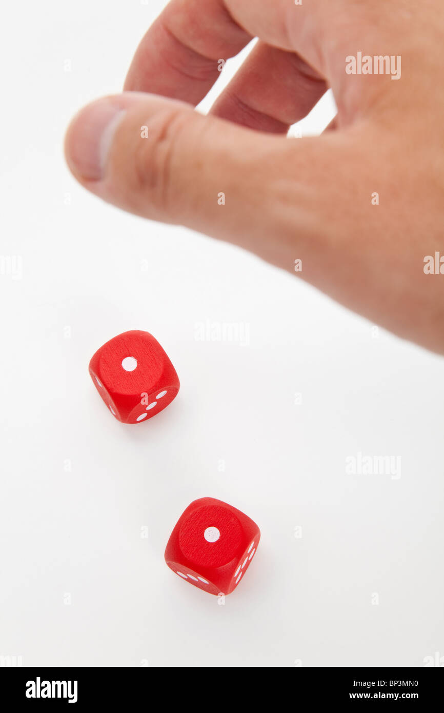 Red dice rolling hi-res stock photography and images - Alamy