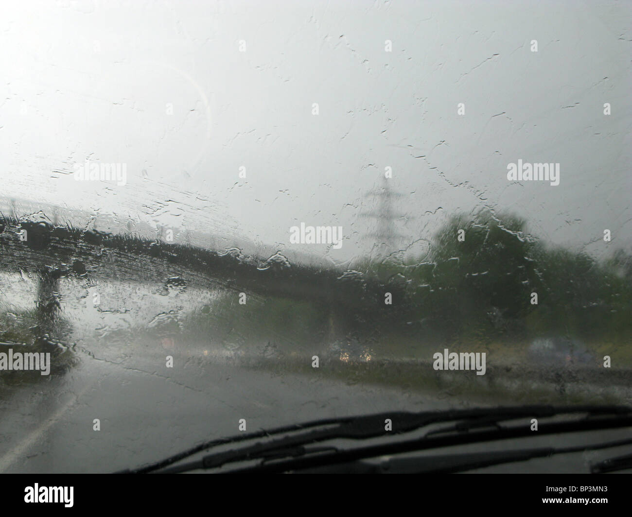 Looking through a car windscreen in the rain Stock Photo - Alamy