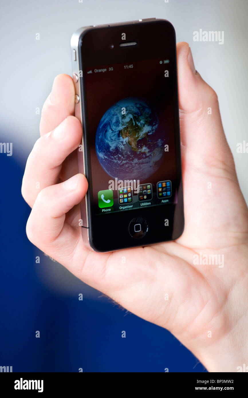 Iphone in blue hi-res stock photography and images - Alamy