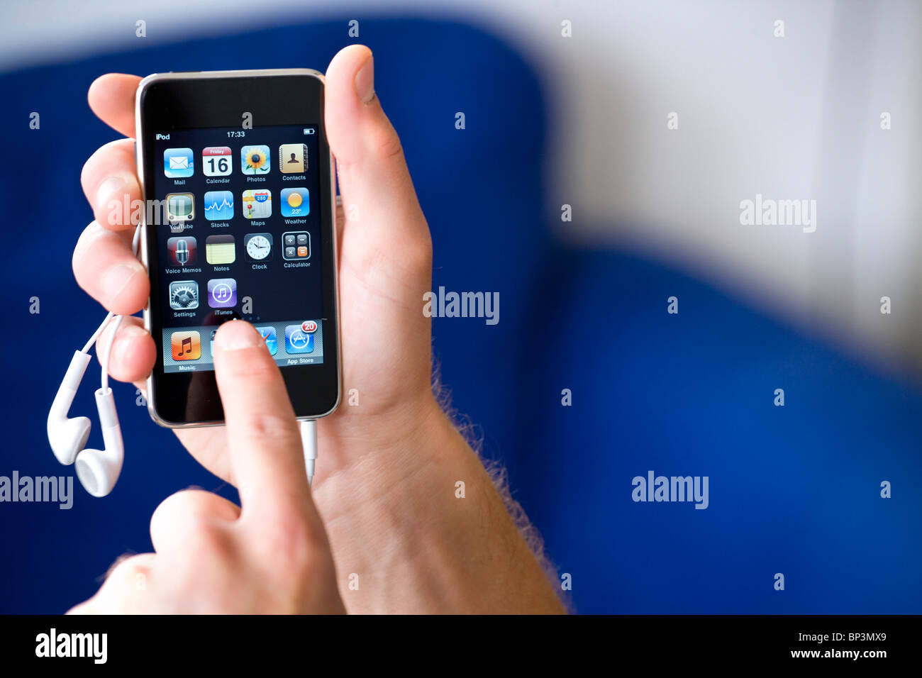 Iphone with headphones Stock Photo - Alamy