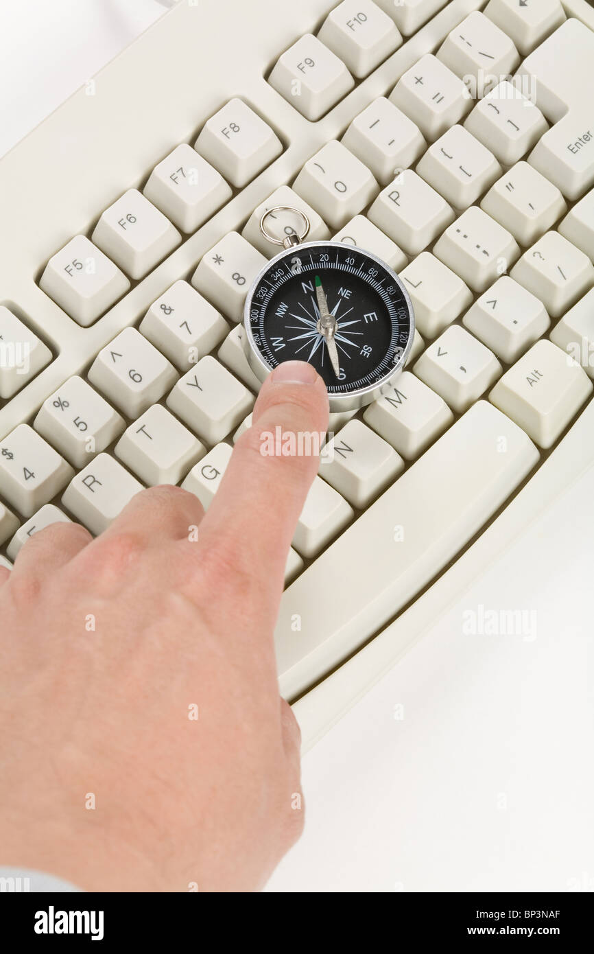 Computer Keyboard and Compass, internet concept Stock Photo - Alamy