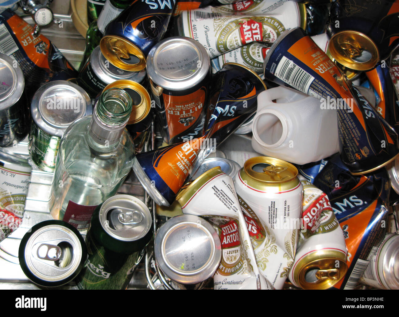 Plastic glass and cans for recycling Stock Photo - Alamy