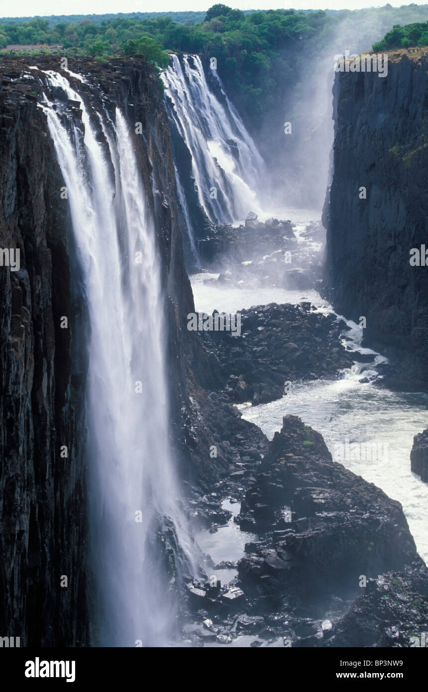 Africa, Zambia, Mosi-Oa-Tunya National Park, Zambezi River pours over ...