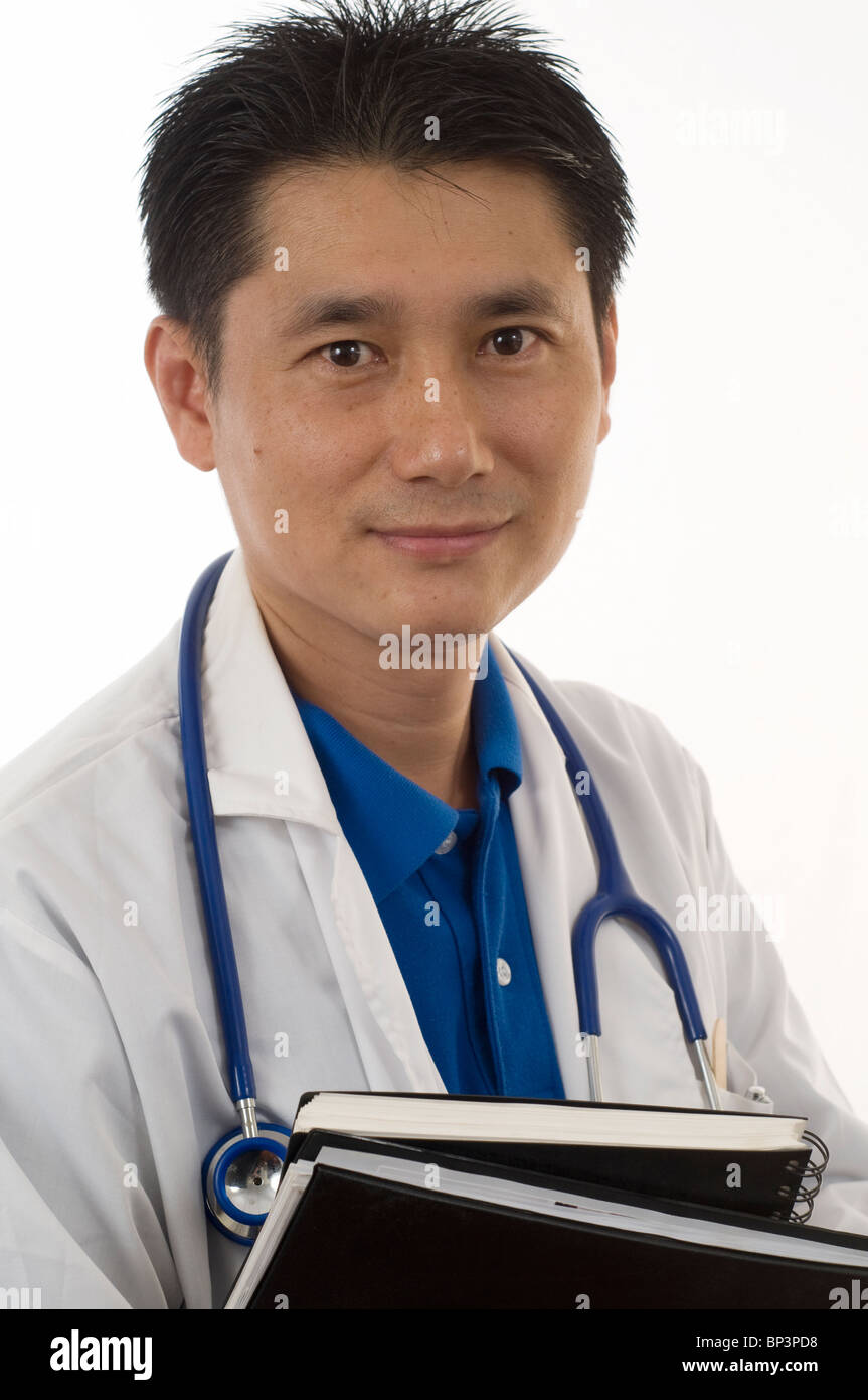 Smiling asian medical doctor standing man isolated hi-res stock ...