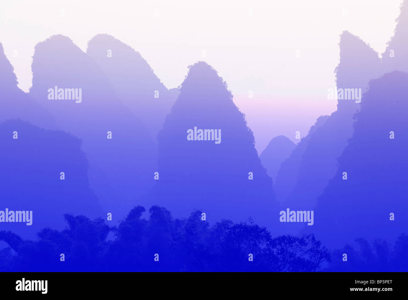 Karst formations along the Yulong River at sunset, China Stock Photo ...