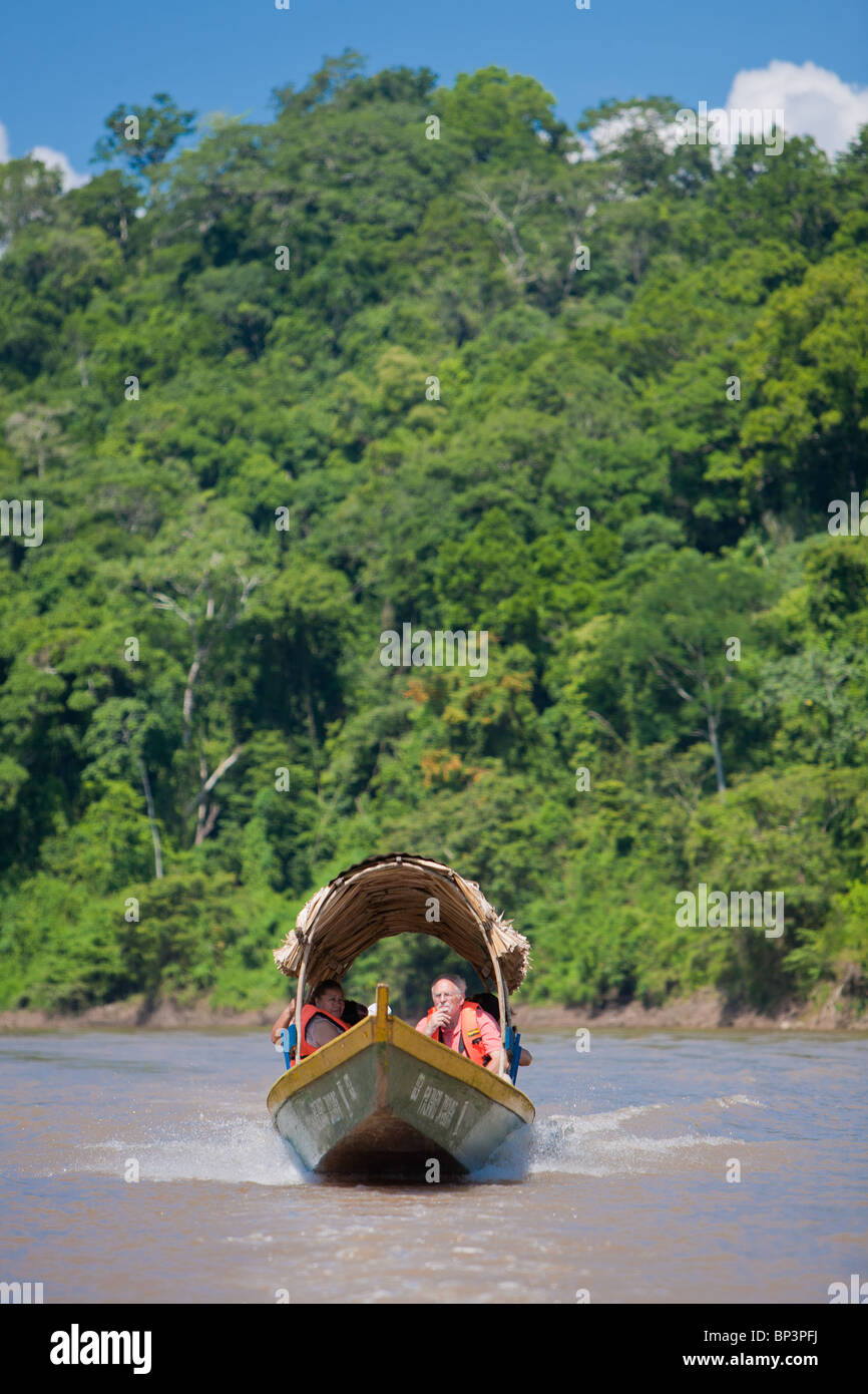 Outboard boat on Usumacinta River taking tourists to Yaxchilan ...