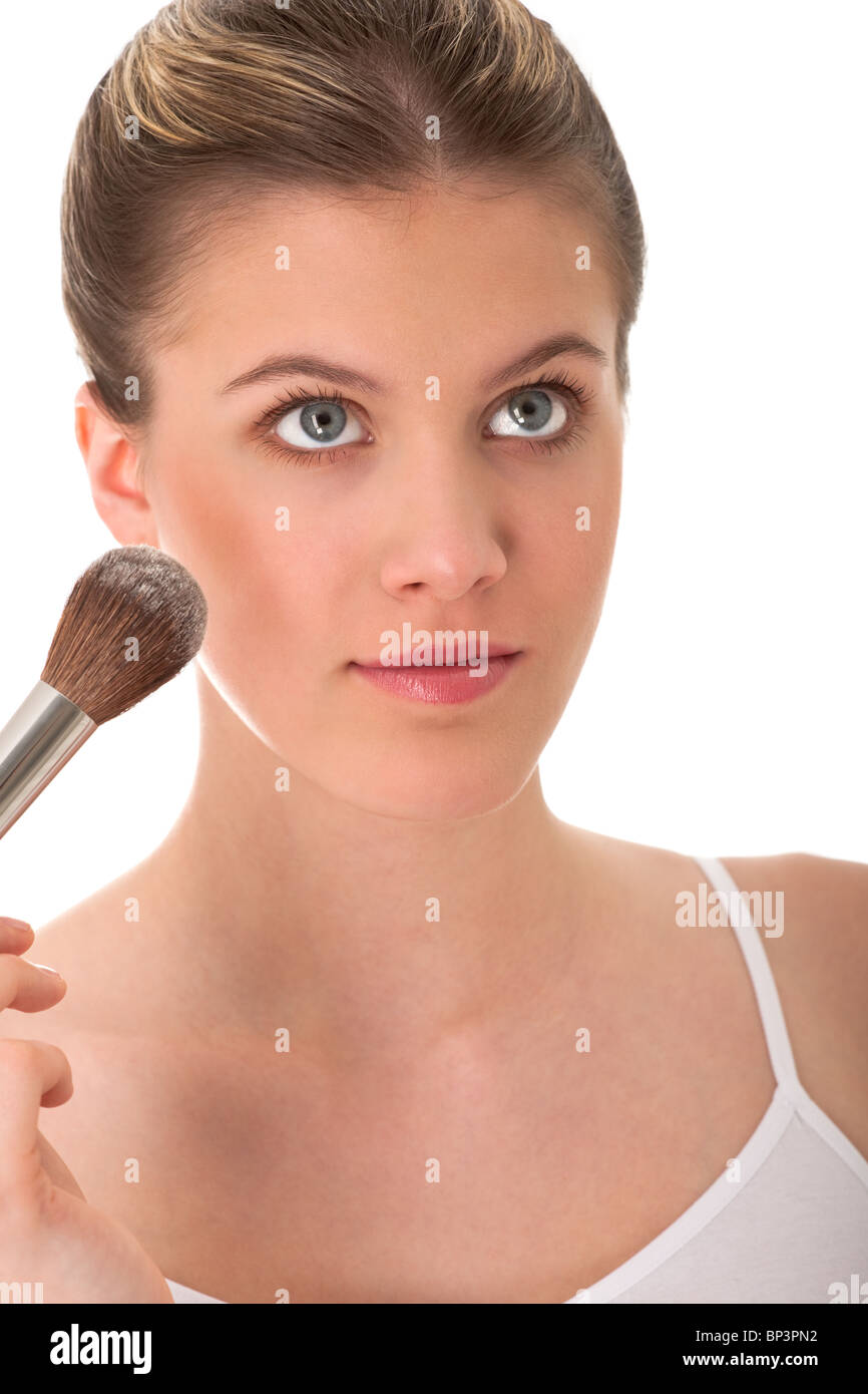 Portrait of beautiful woman applying powder Stock Photo - Alamy