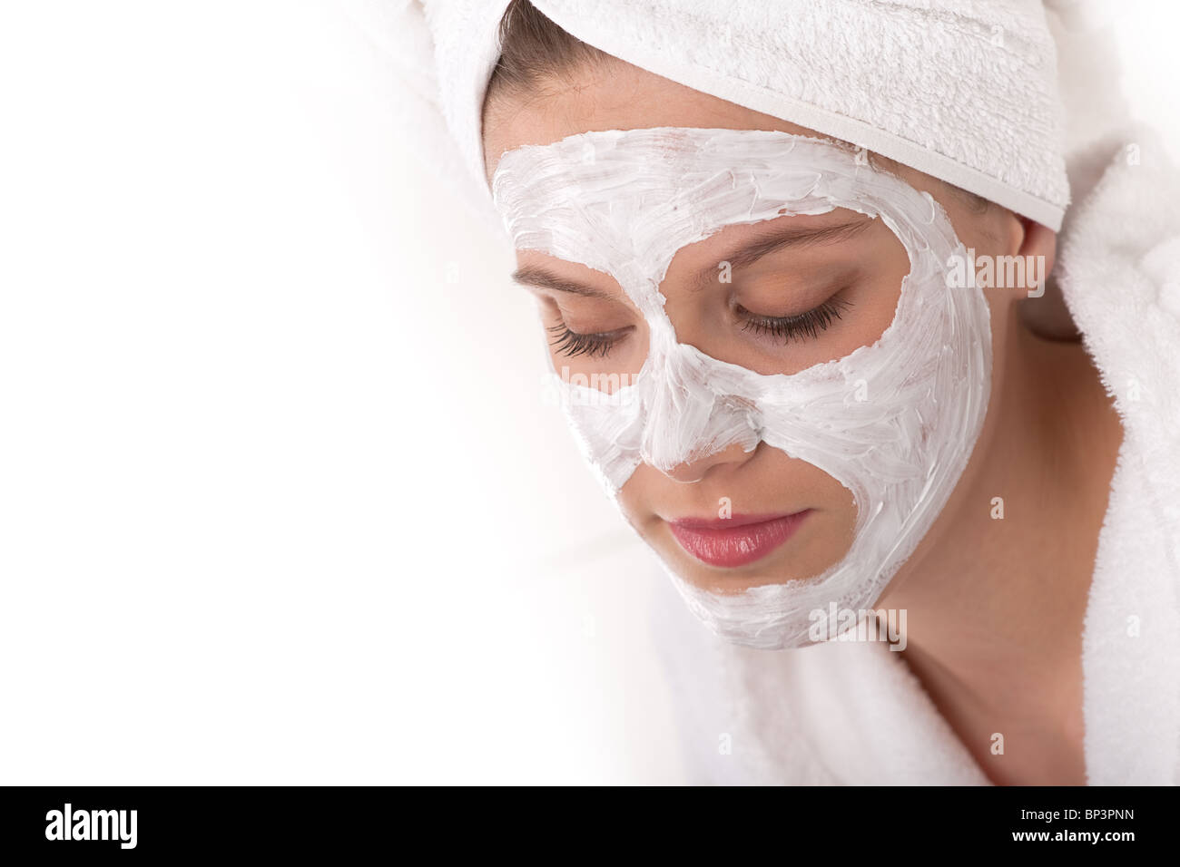 Beautiful woman with facial mask Stock Photo - Alamy