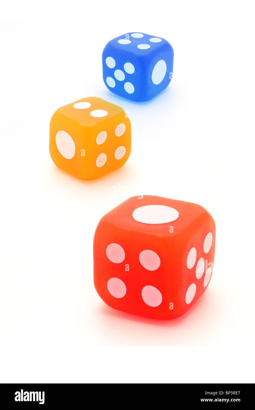 Three colorful rubber dice on white background Stock Photo - Alamy