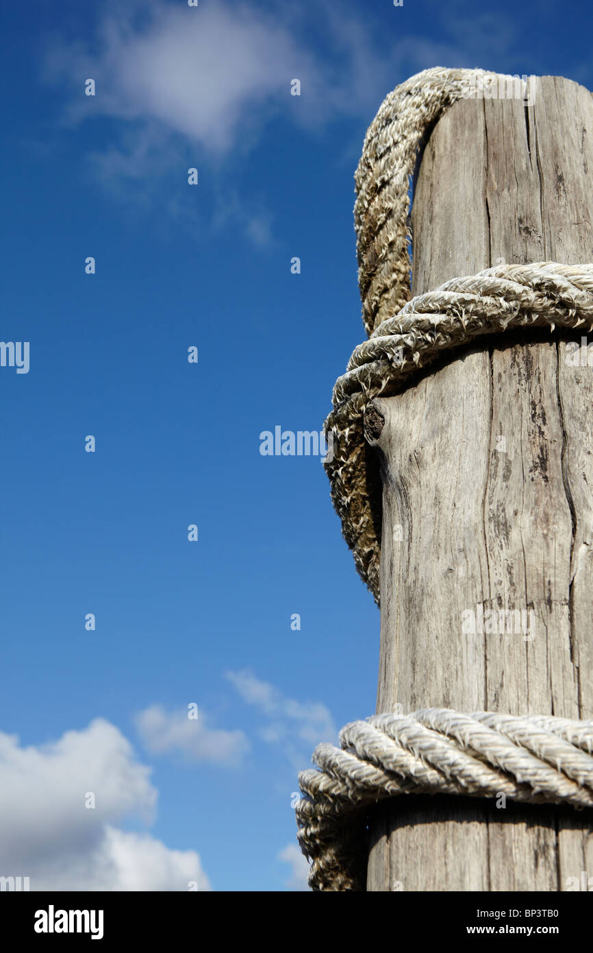Rope on a wooden post at a beach in Follonica, Italy Stock Photo - Alamy