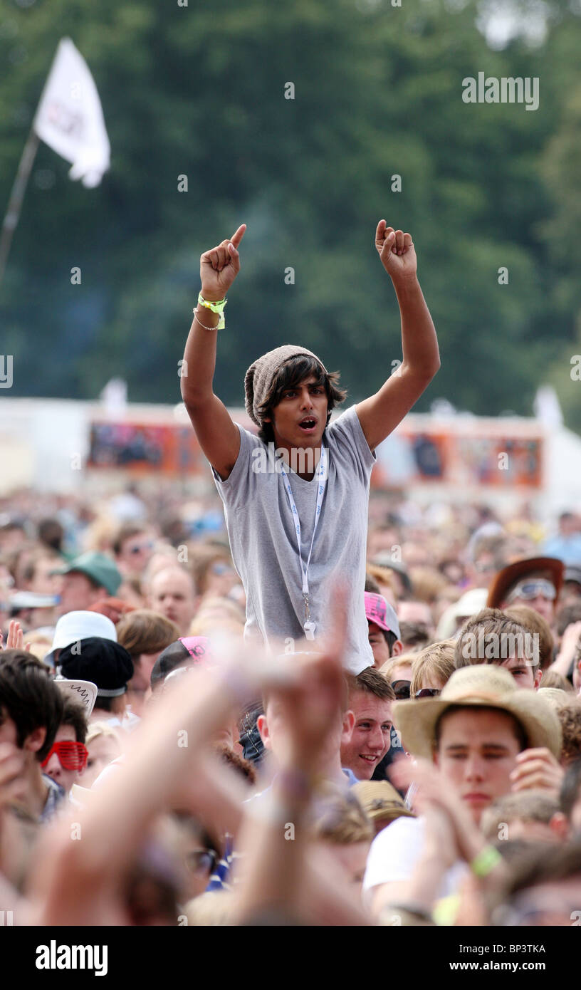 A man cheering in the crowd at V Festival Stock Photo - Alamy