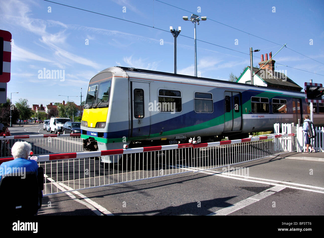 National Express train passing level crossing, Connaught Avenue ...