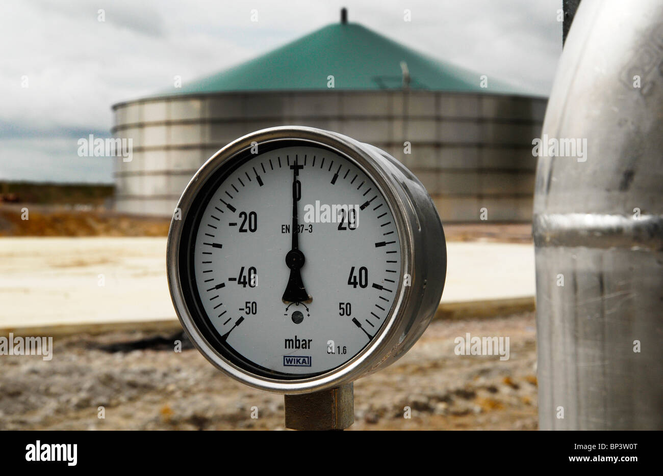 Pressure guage and storage tanks at Rothwell bio farm, UK, 2010 Stock ...