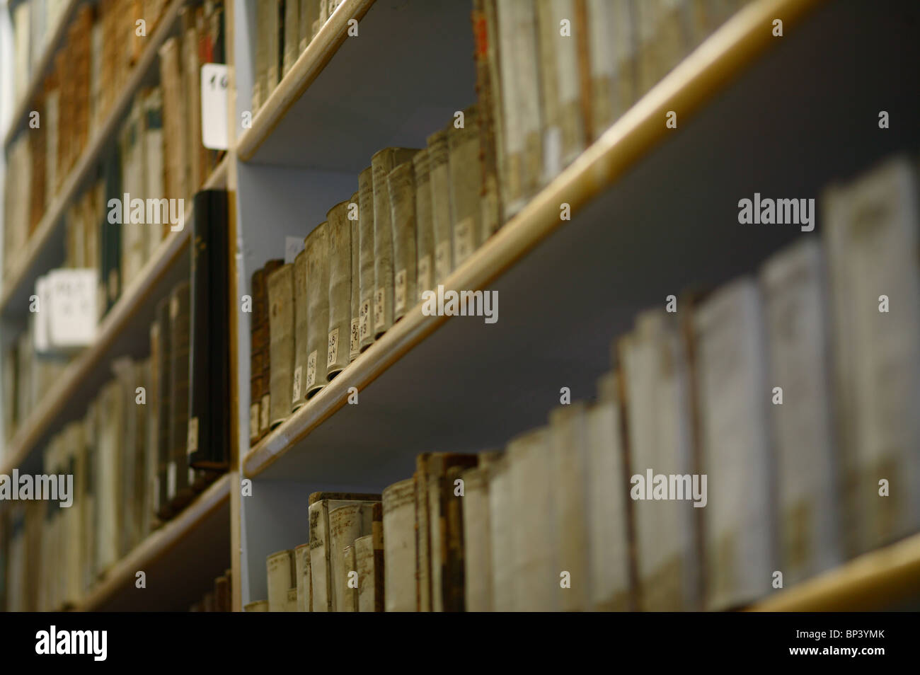 Old books in a library bookcase Stock Photo - Alamy