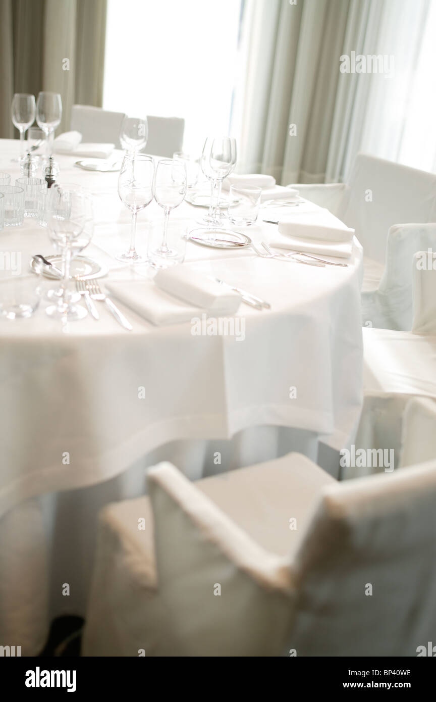 A set table whole in white Stock Photo - Alamy