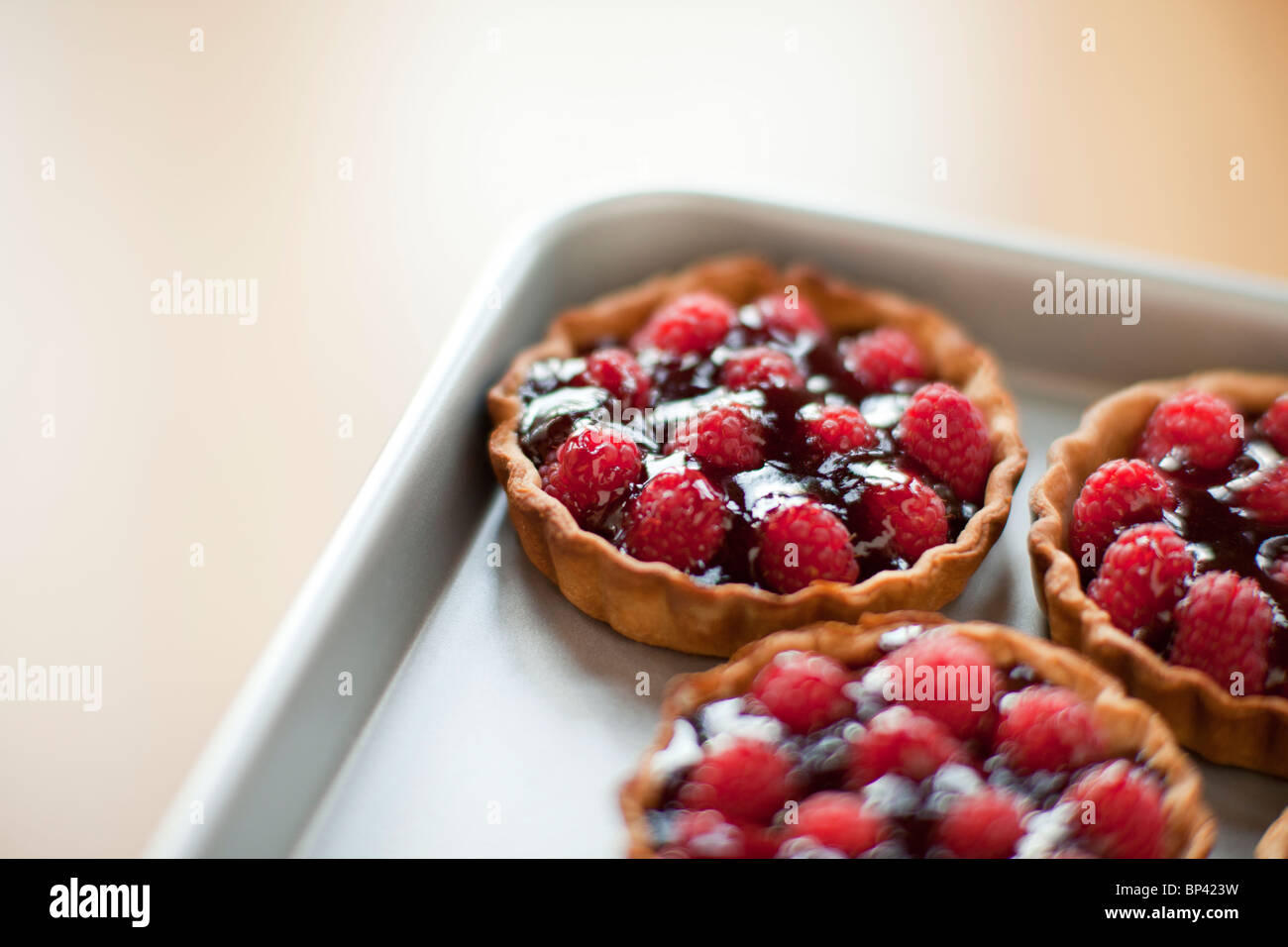 Close-up of Raspberry Tarts Stock Photo - Alamy