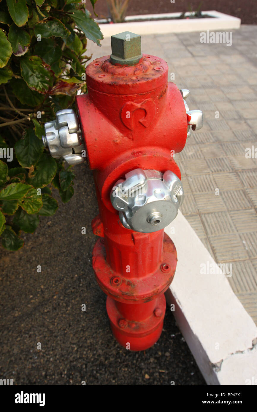 Fire hydrant at holiday apartment complex Stock Photo - Alamy