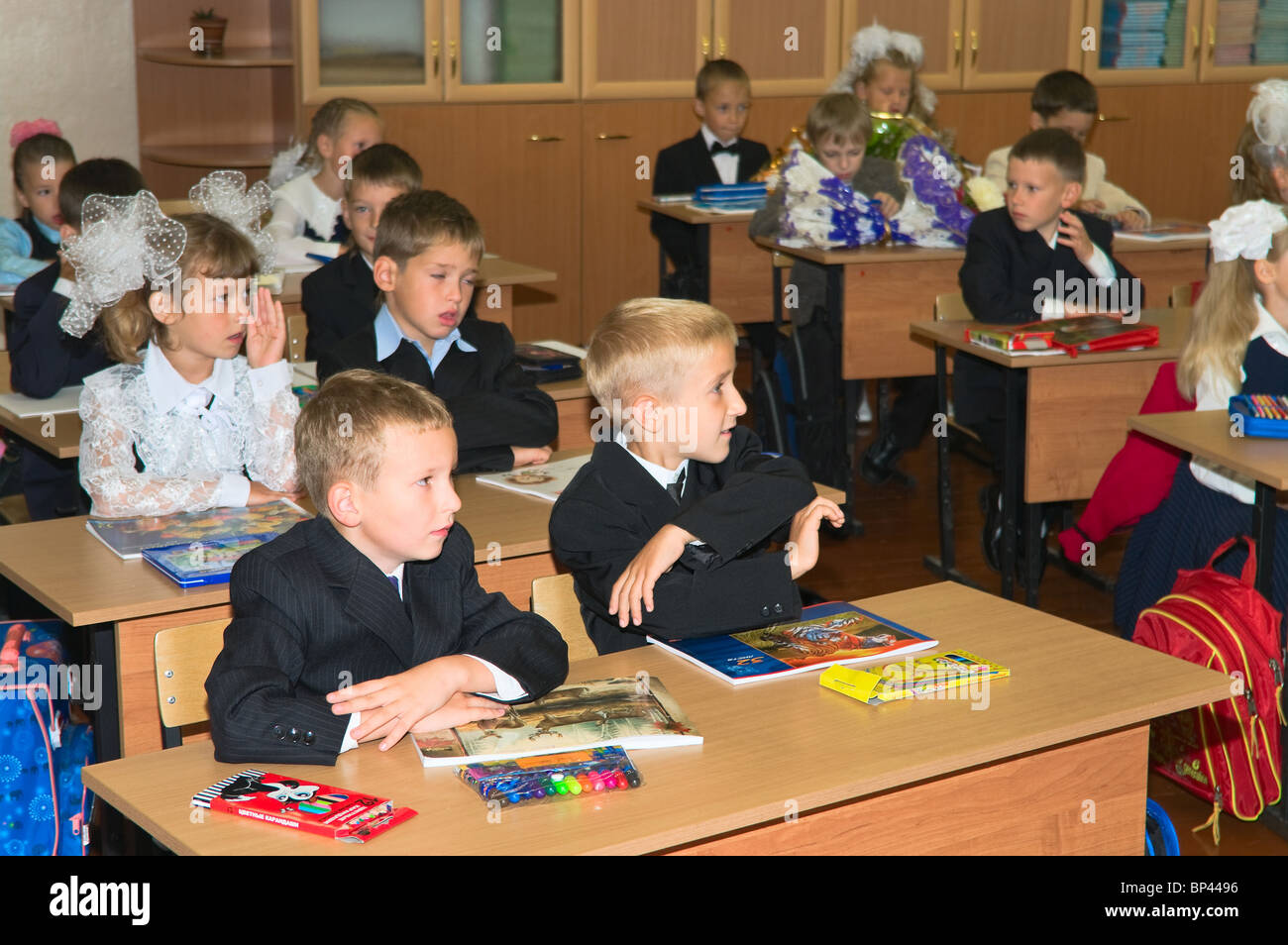 Russian boys and girls Caucasians students are sitting on the lesson in ...