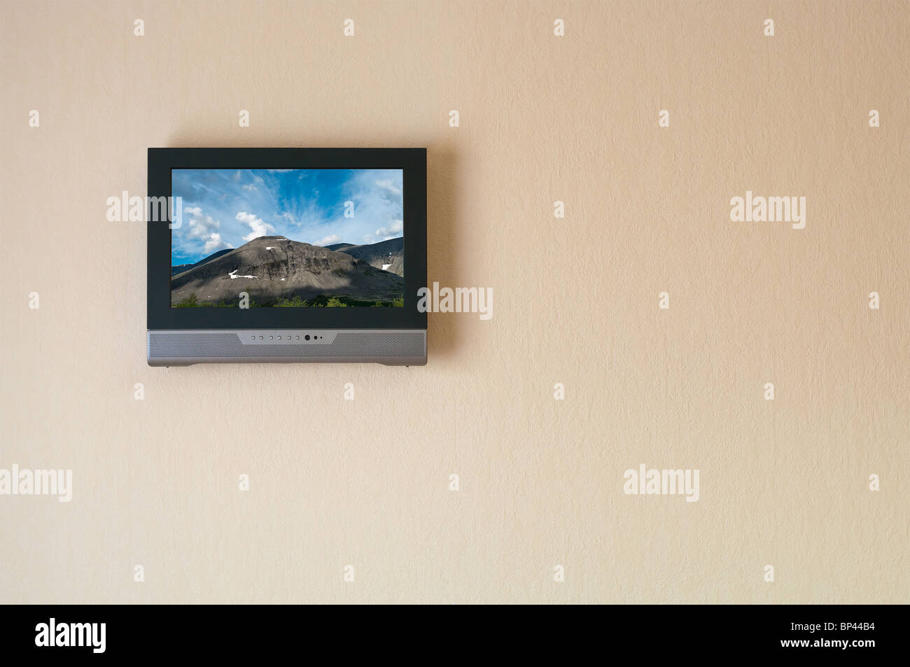 Liquid-crystal television receiver on wall. Picture on screen. Copy ...
