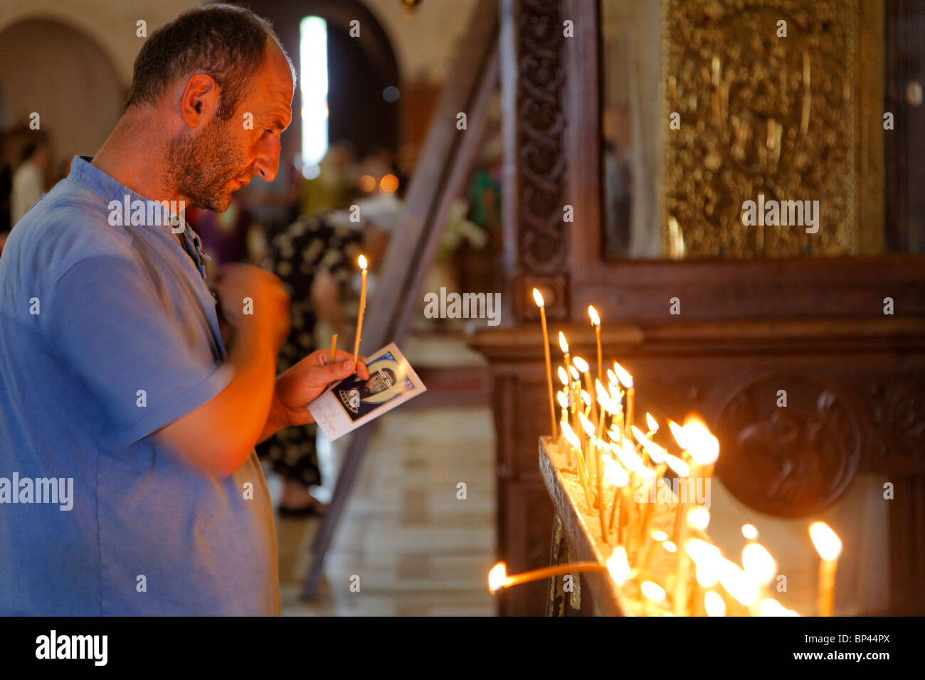 Georgia - Tbilisi - candles inside the Tsminda Sameba Cathedral Stock ...