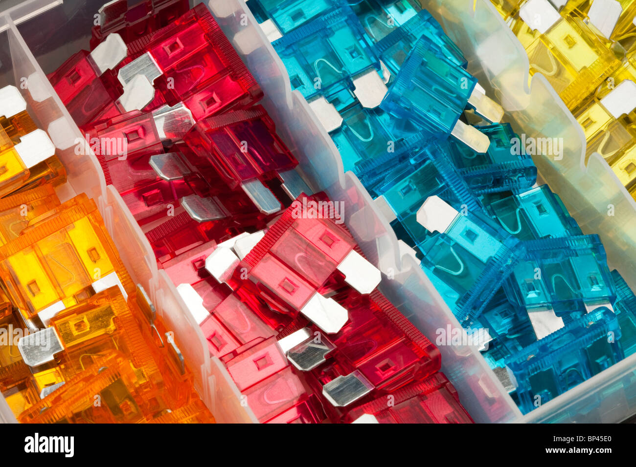 Automotive Electrical Blade fuses in compartments Stock Photo - Alamy