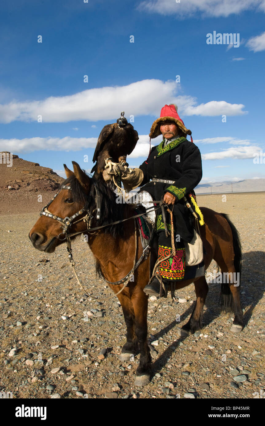 Kazakh man at Altai Eagle Festival, Khujek Stock Photo - Alamy