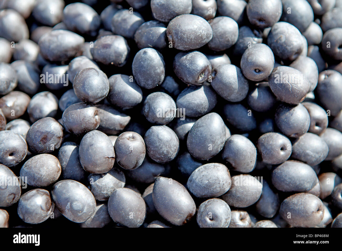 group of black olives can be used as background Stock Photo - Alamy