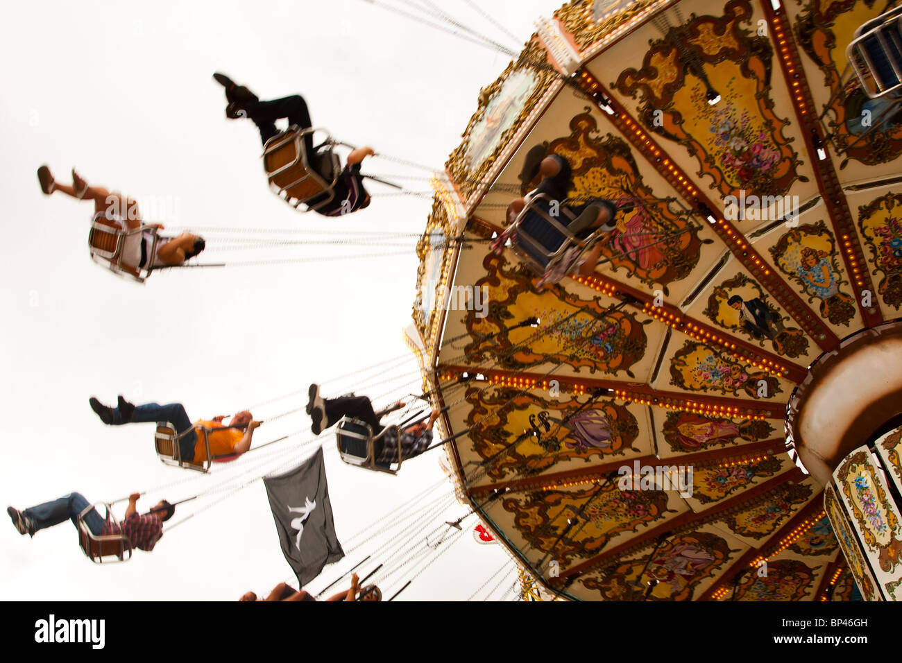 Swing carousel ride at a fairground in Brighton UK Stock Photo - Alamy