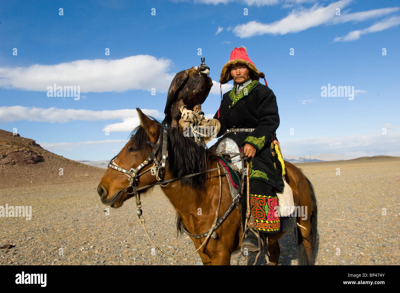 Kazakh man at Altai Eagle Festival, Khujek Stock Photo - Alamy