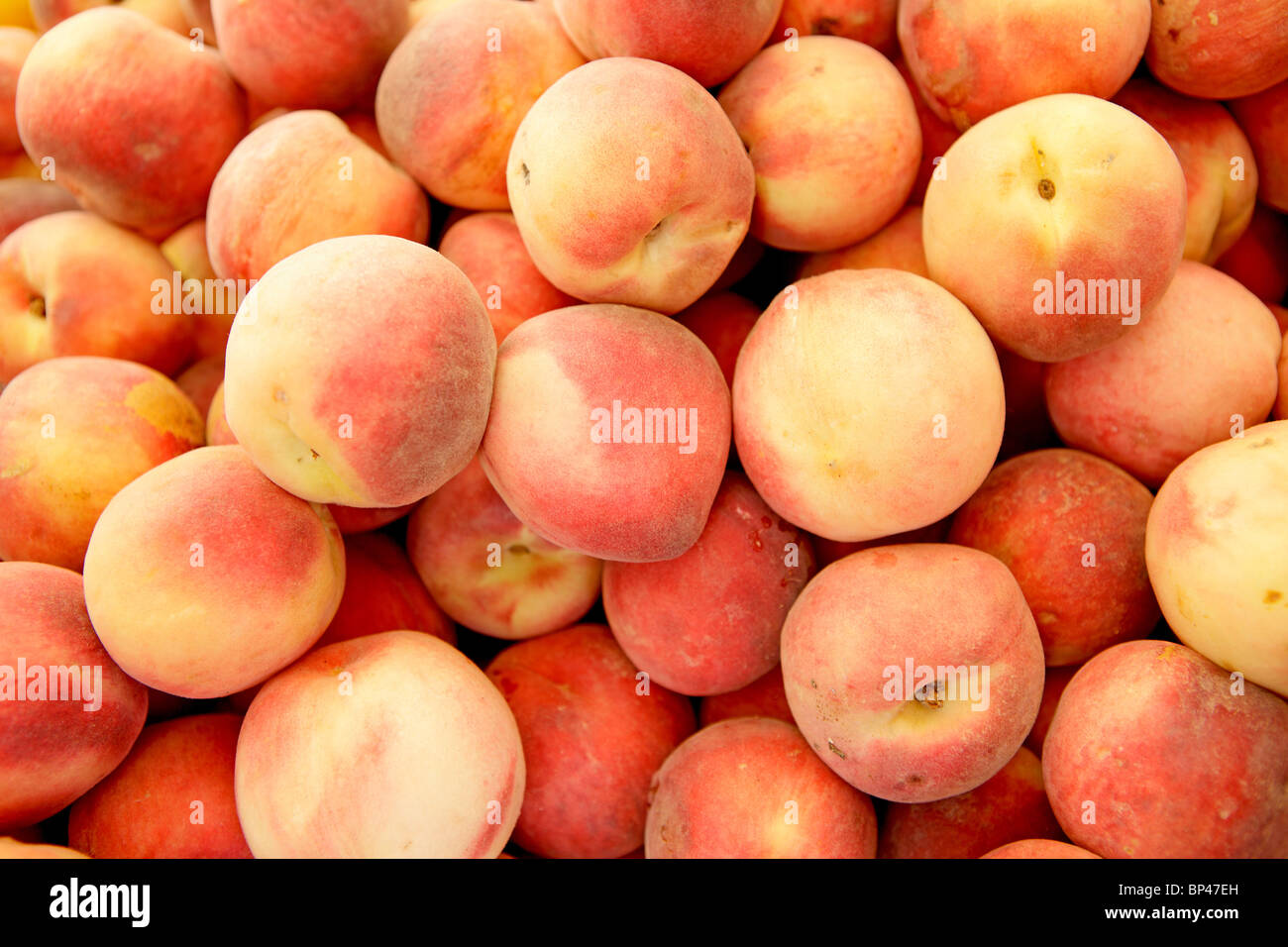 group of fresh peaches in closeup can be used as background Stock Photo ...