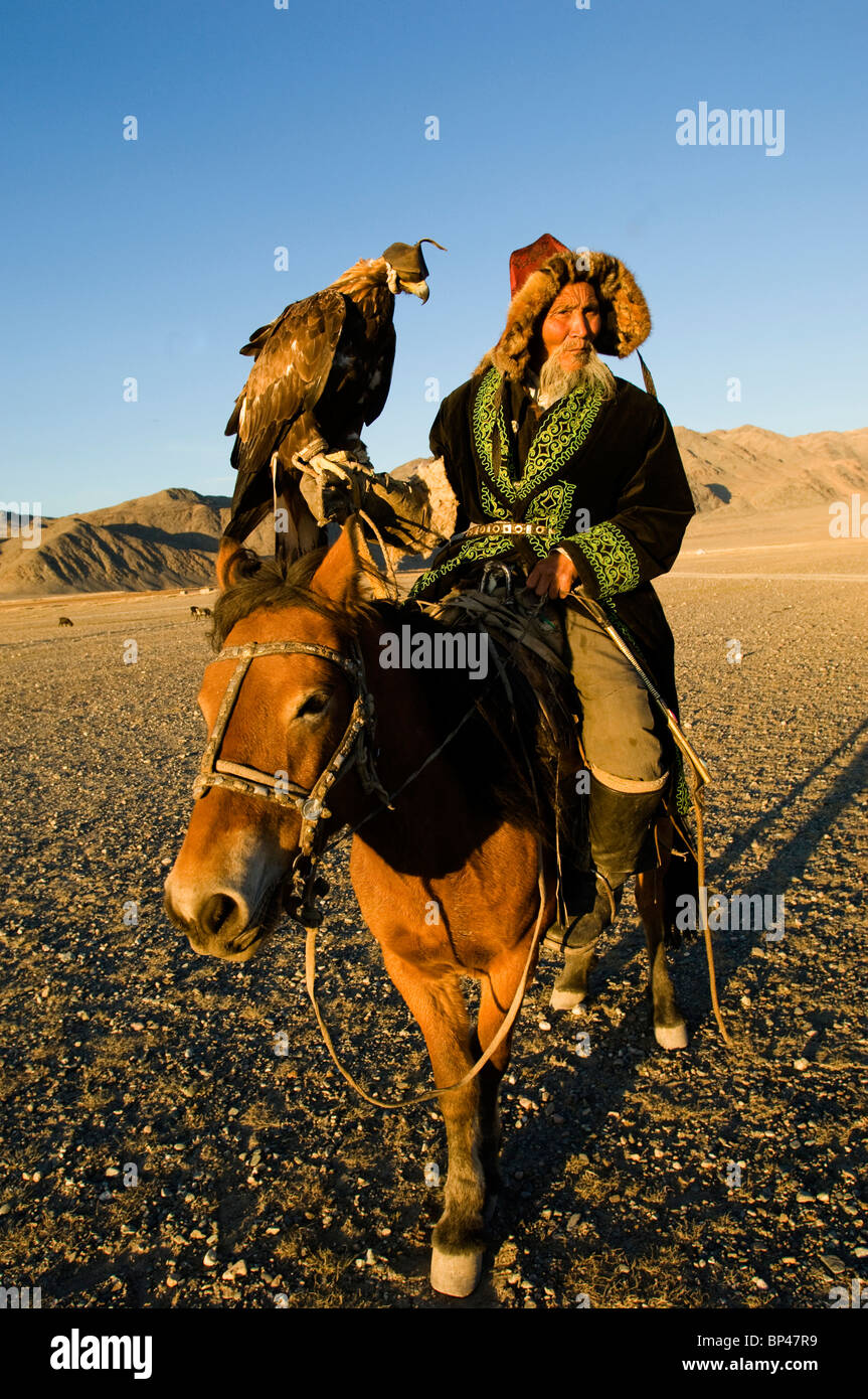 Men with eagle at Altai Eagle Festival Stock Photo - Alamy