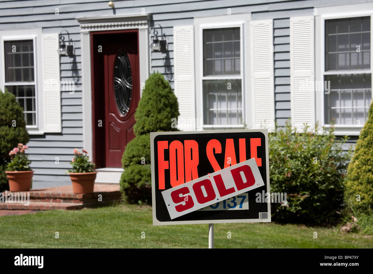 Showcase House with Sold Sign Stock Photo - Alamy