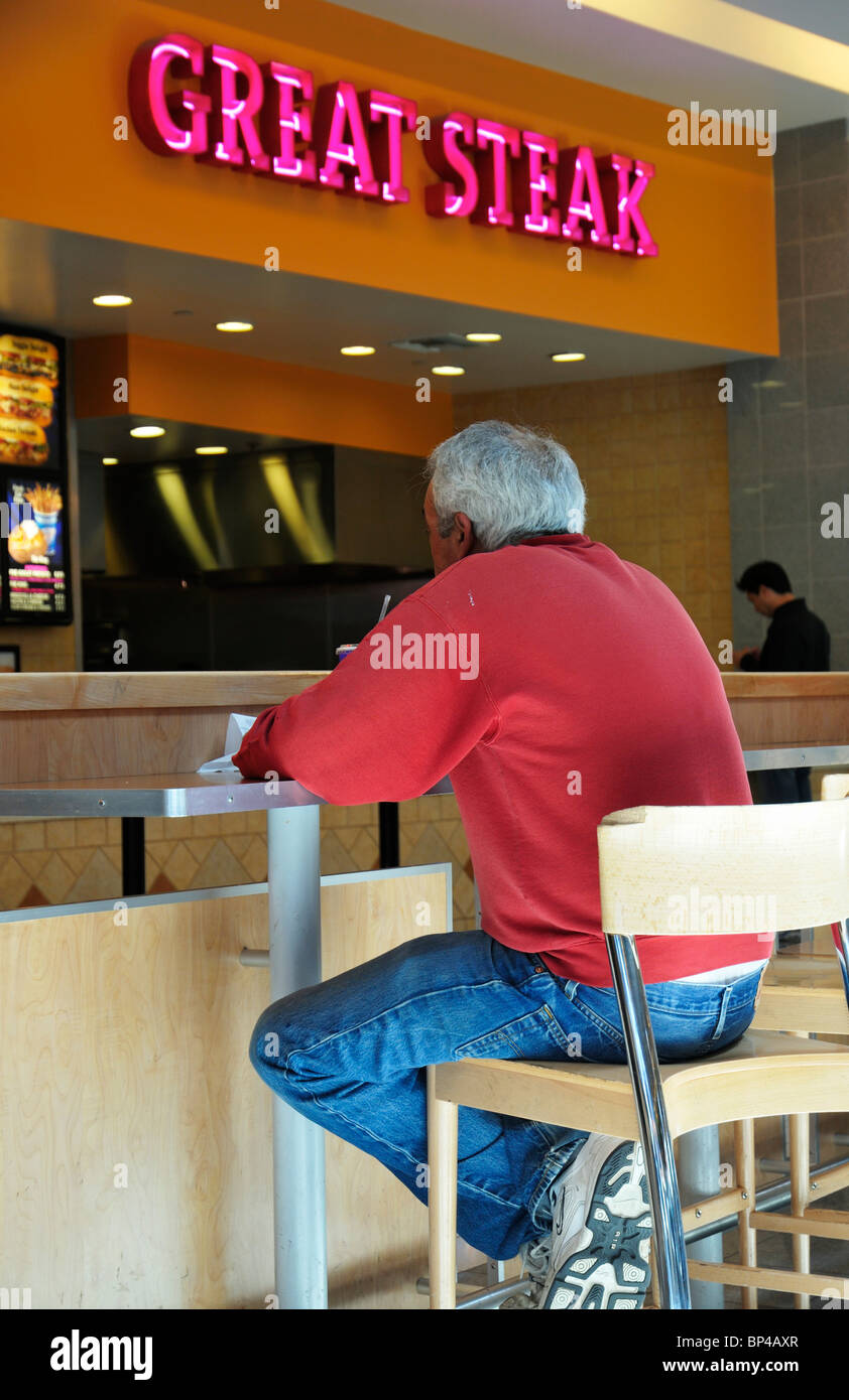 A customer enjoying Great Steak cheesesteaks, Burlingame CA Stock Photo ...