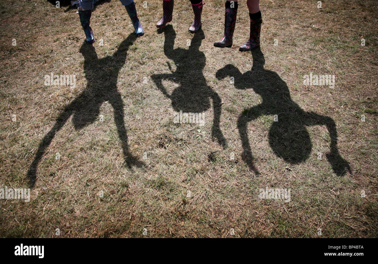 Shadows of music fans dancing at V Festival in Chelmsford Stock Photo ...