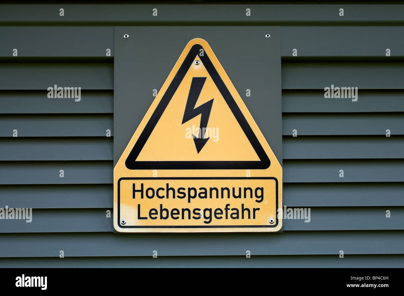 High voltage triangle warning sign hi-res stock photography and images ...