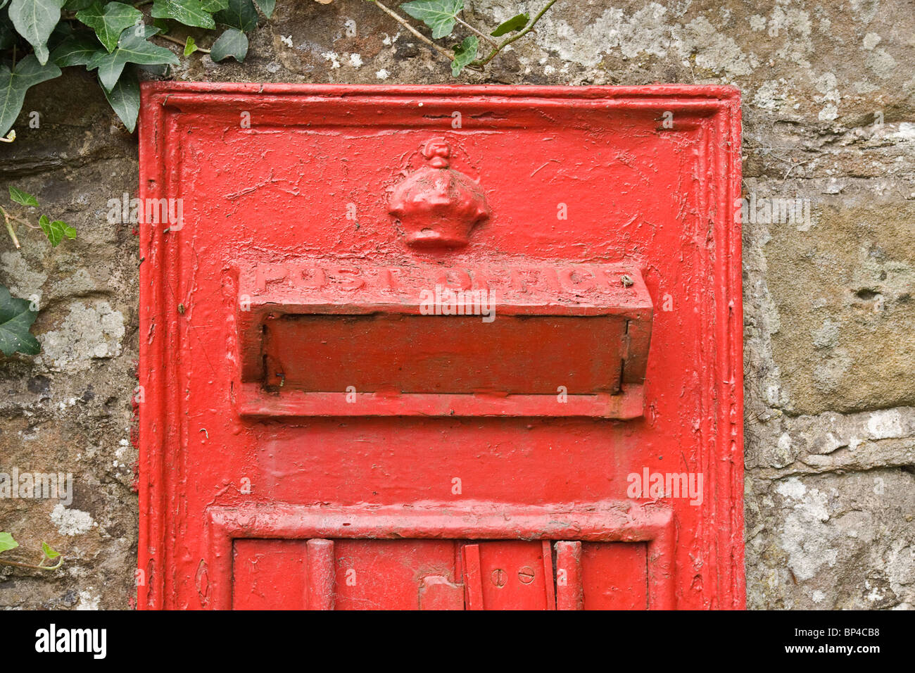 A rural postbox decommissioned and blocked up Stock Photo - Alamy