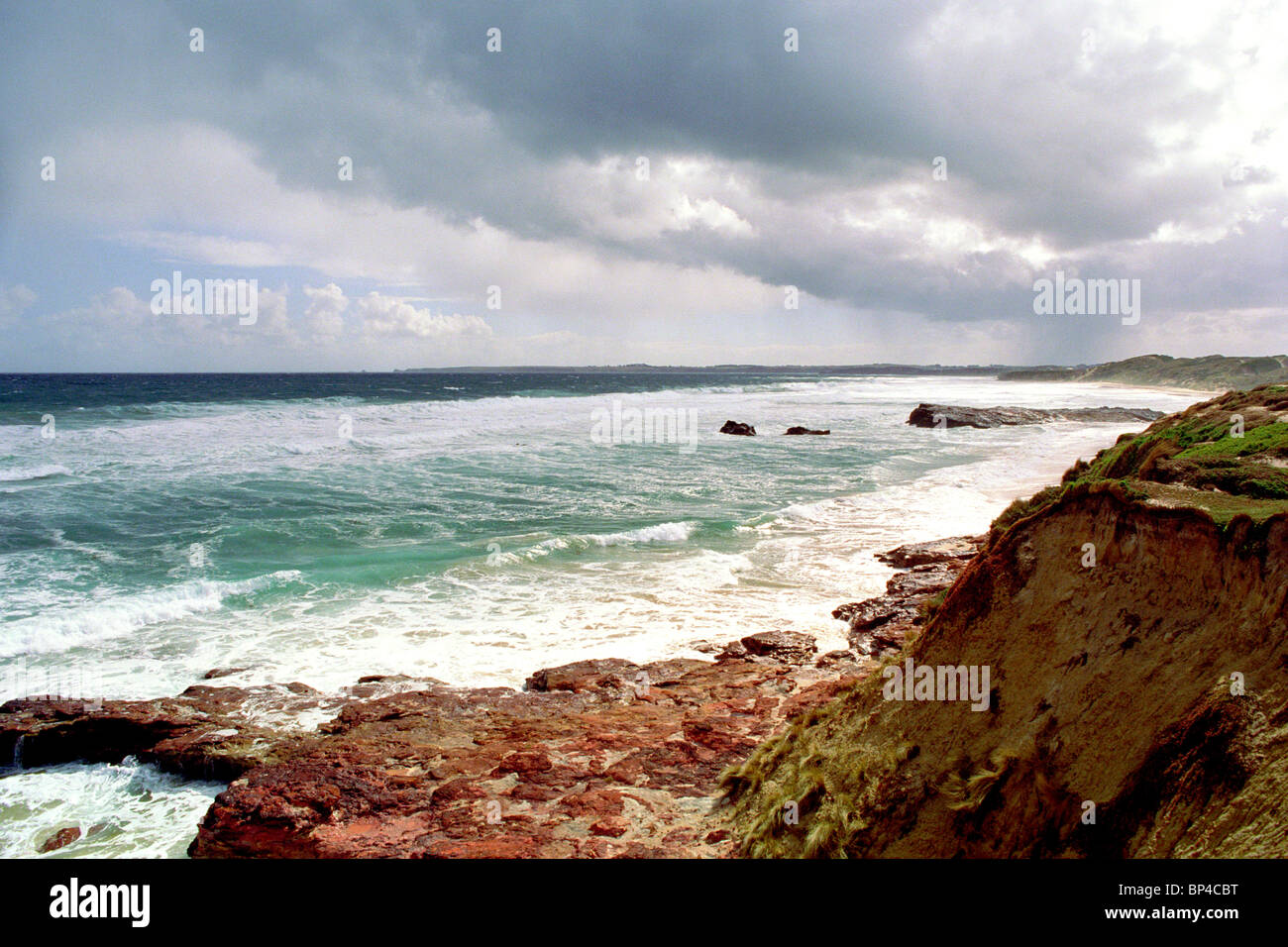 Coastal red cliffs Stock Photo - Alamy