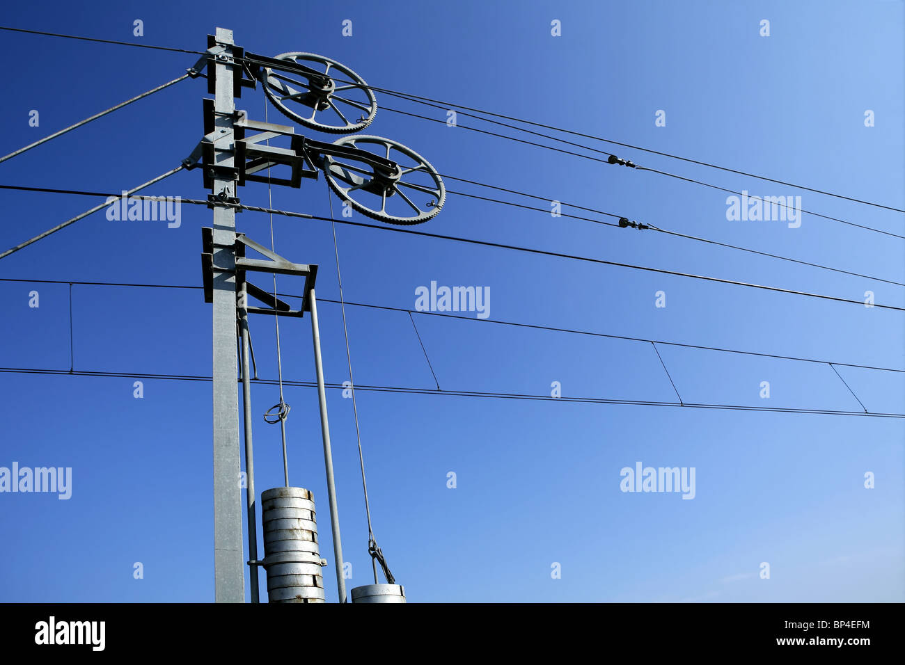 Cables and pole tower, electric train railway Stock Photo - Alamy
