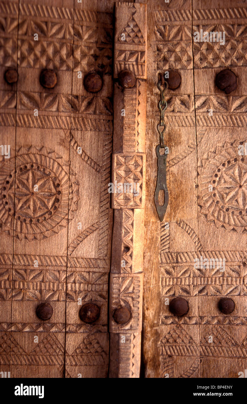 A old carved wooden door on a house in Doha Qatar, 1975 Stock Photo - Alamy