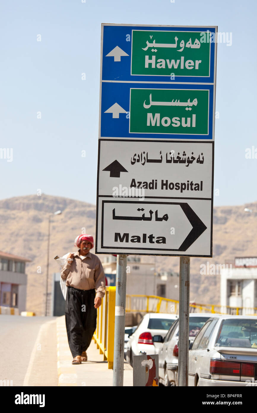 Road signs to Erbil or Hawler and Mosul in Dohuk, Iraq Stock Photo - Alamy