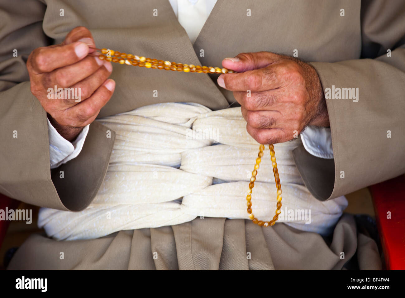 Kurdish Iraqi man counting Muslim prayer beads in Dohuk, Kurdistan ...